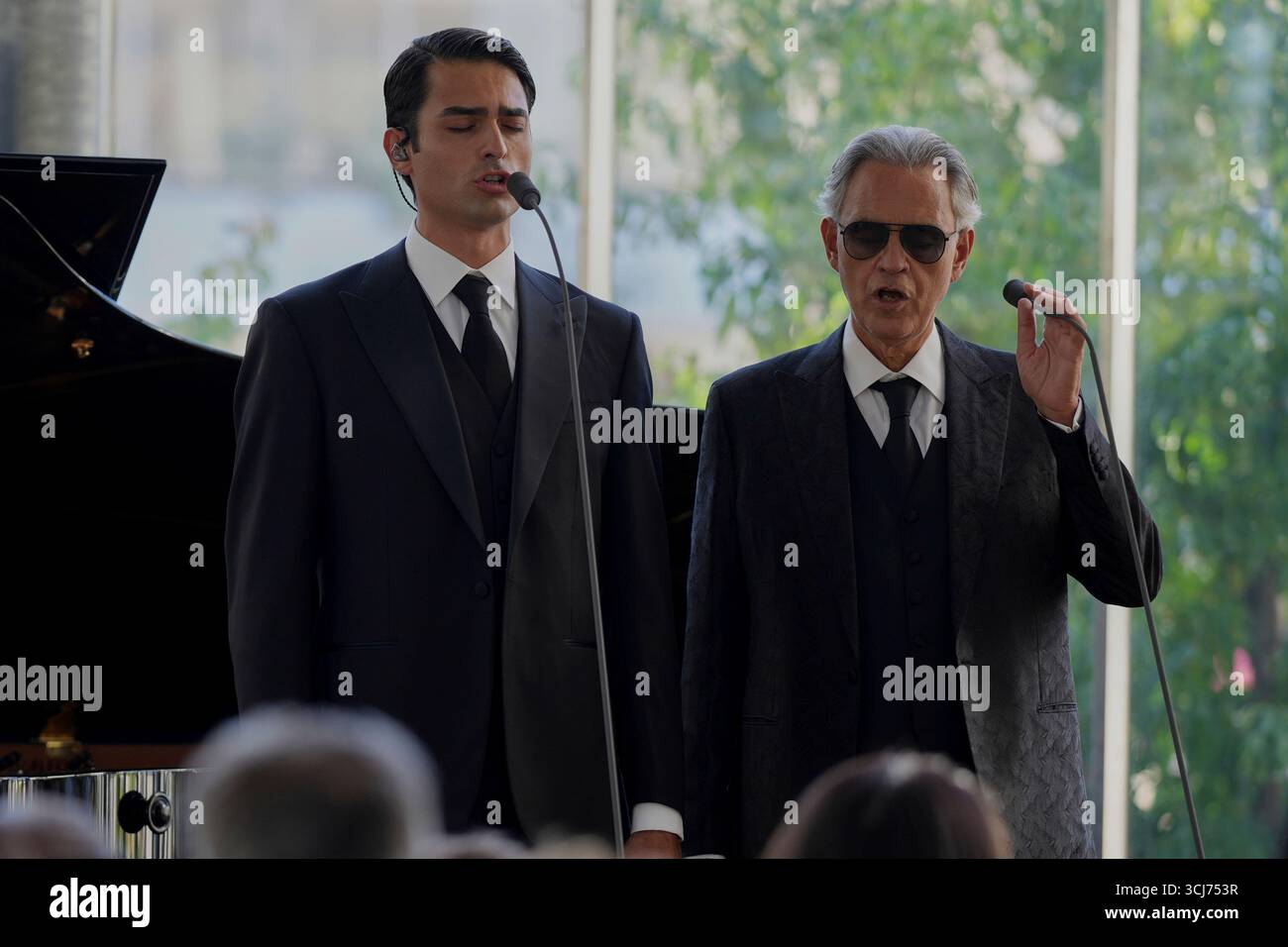 Andrea Bocelli, right, and his son Matteo sing at the inauguration of ...