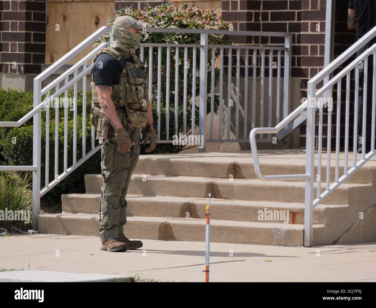 Masked ice agent hi-res stock photography and images - Alamy