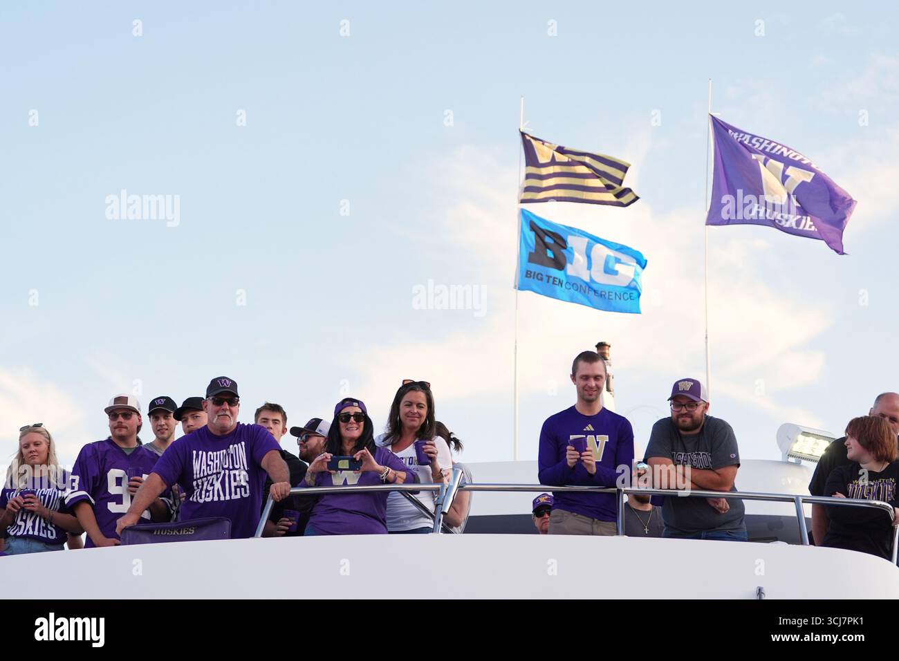 Washington fans look down as they watch the Husky Marching Band perform ...