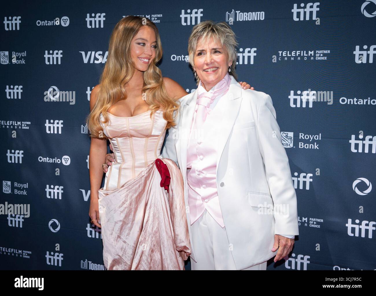 Sydney Sweeney and Christy Salters pose for photographs as they walk the red carpet at the ...