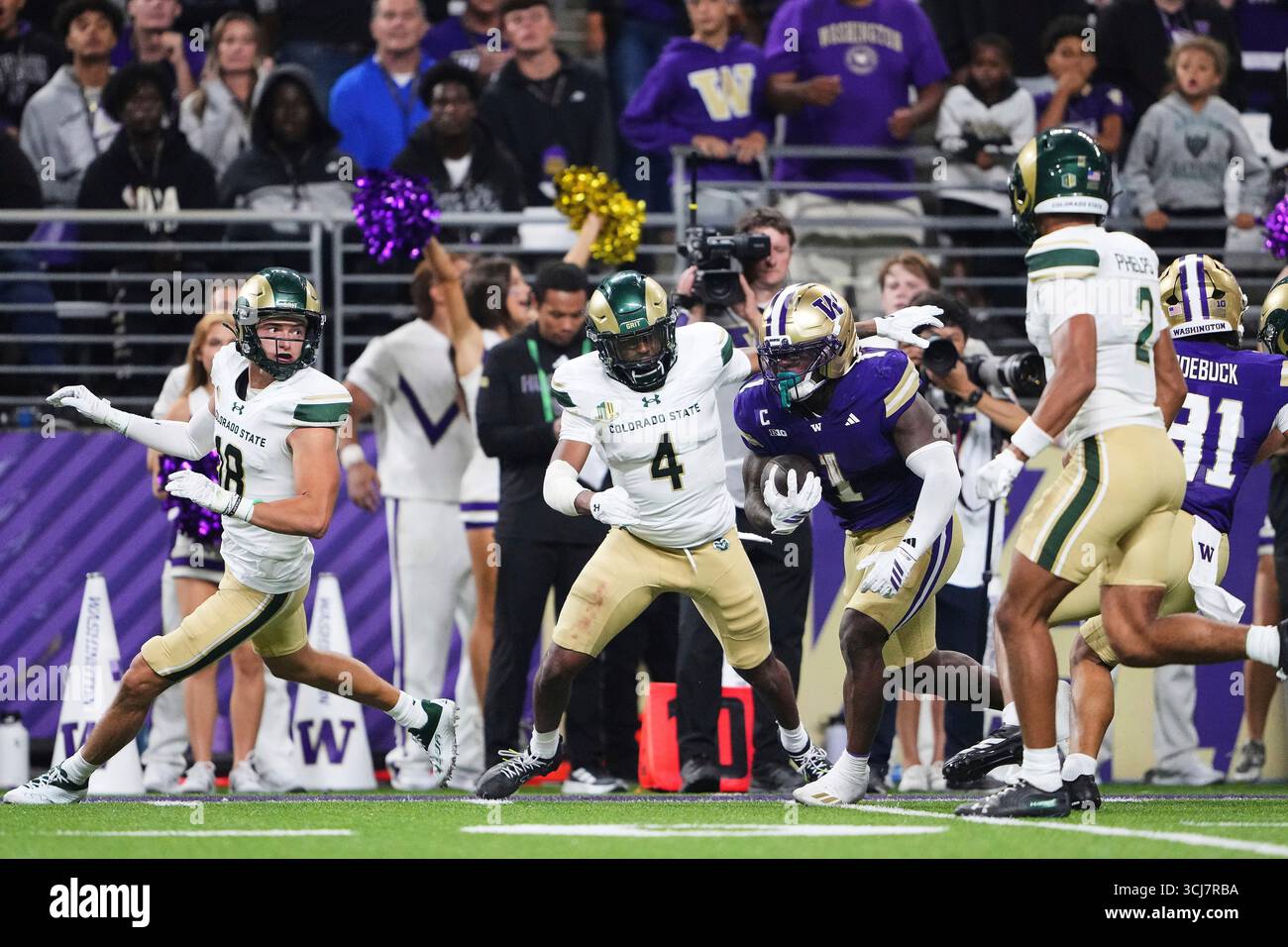 Washington running back Jonah Coleman runs the ball against Colorado State, including defensive ...