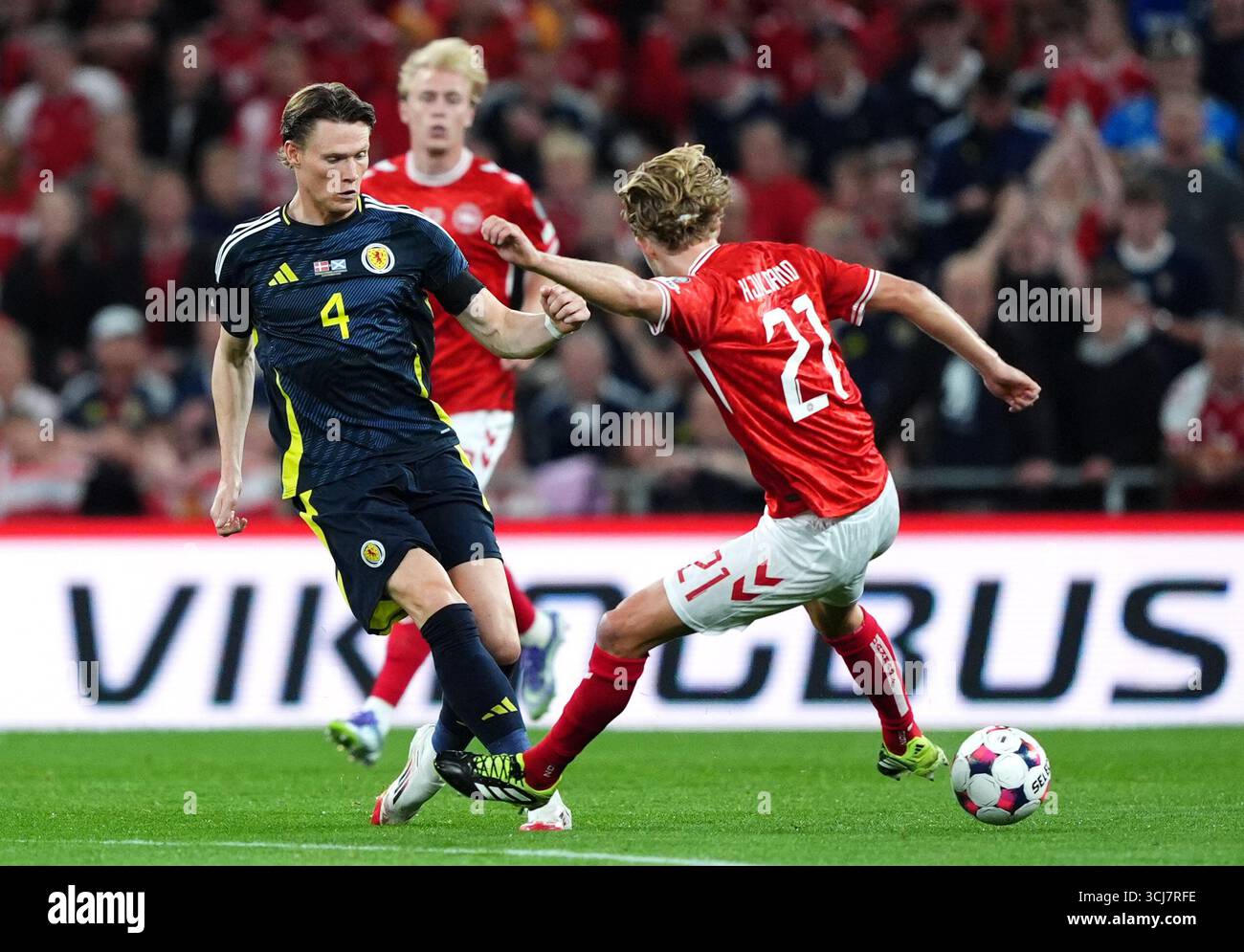 Scotland's Scott McTominay (left) and Denmark's Morten Hjulmand battle ...