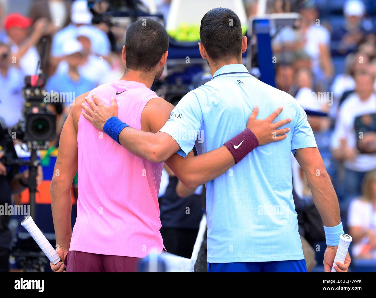 Novak Djokovic of Serbia (R) and Carlos Alcaraz of Spain pose for a ...
