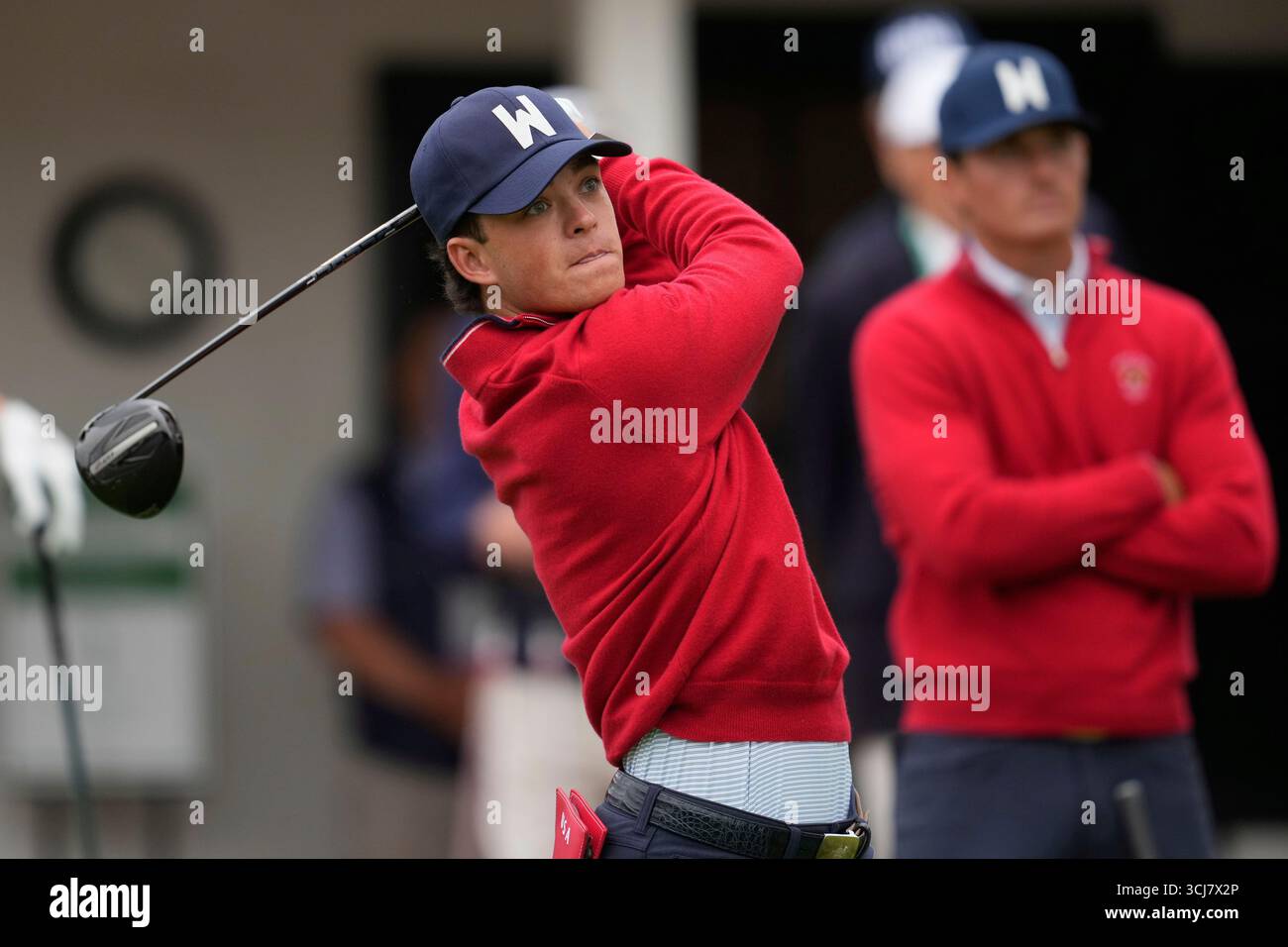 The USA team's Jackson Koivun hits during a practice round before the Walker Cup golf matches ...