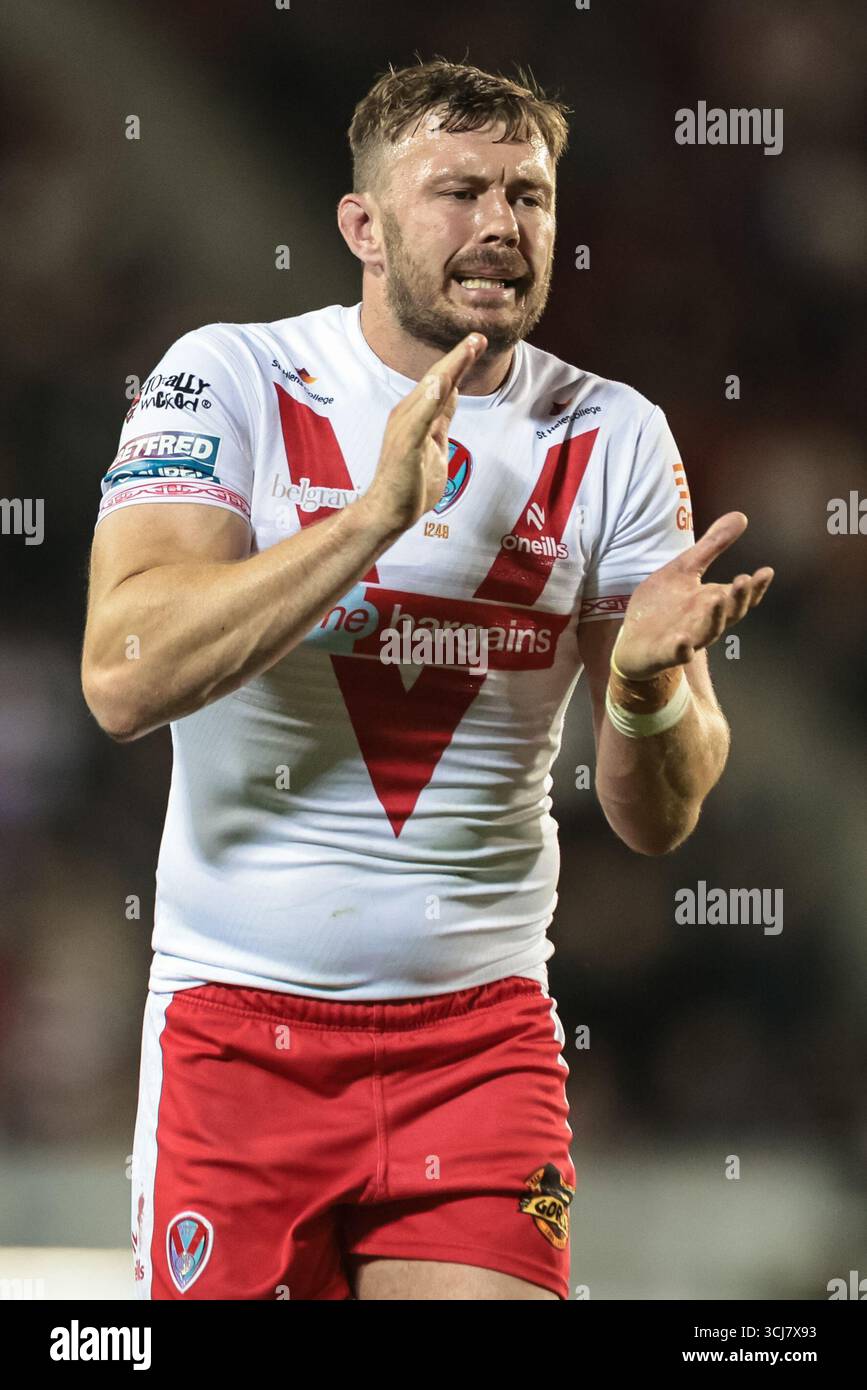 Joe Batchelor of St Helens applauds his teammates during the Betfred ...