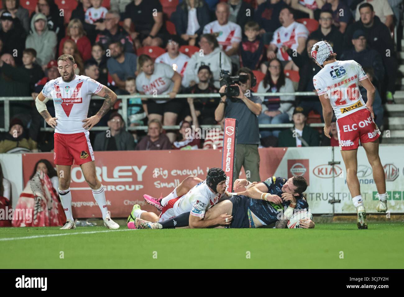 Jake Wardle of Wigan Warriors goes over for a try during the Betfred ...
