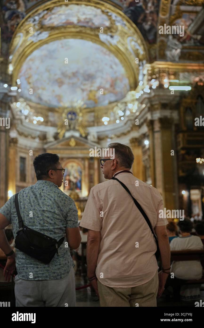 Justin Del Rosario, left, and John Capozzi attend attend a vigil prayer ...