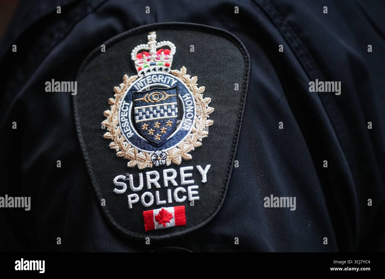A Surrey Police Service patch is seen on an officer's uniform in Surrey ...