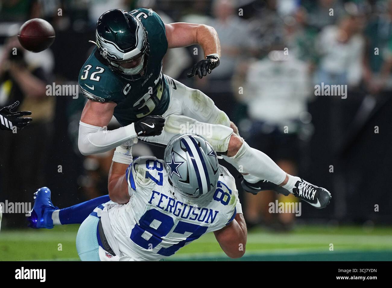 Dallas Cowboys tight end Jake Ferguson (87) takes a hit from ...