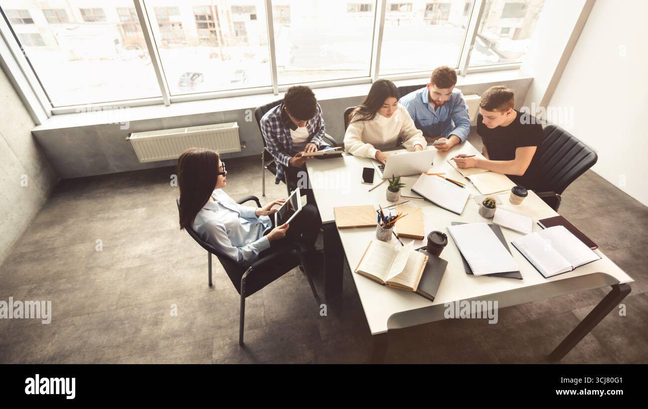 Multiracial students doing group study hi-res stock photography and ...