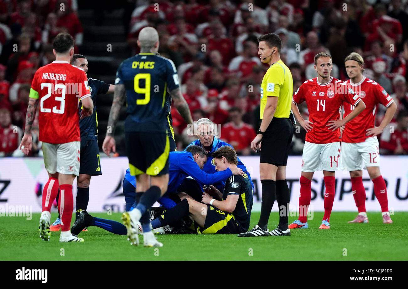 Scotland's Scott McTominay receives treatment for an injury during the ...