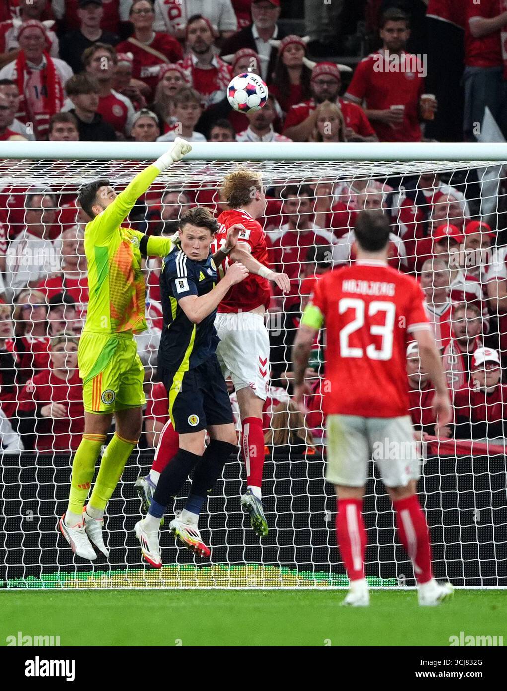 Scotland goalkeeper Angus Gunn punches the ball clear during the World ...