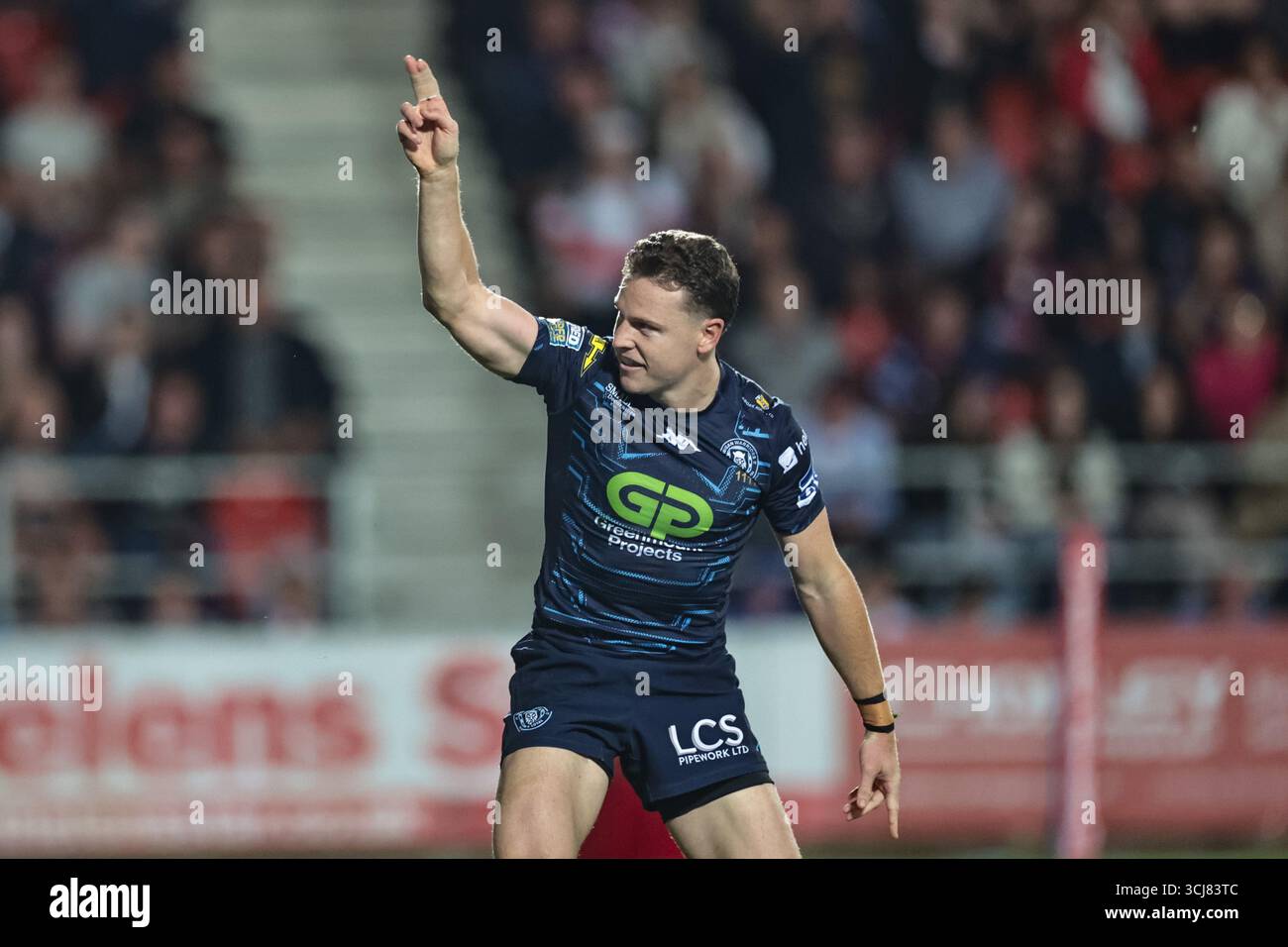 Jai Field of Wigan Warriors celebrates his try during the Betfred Super ...