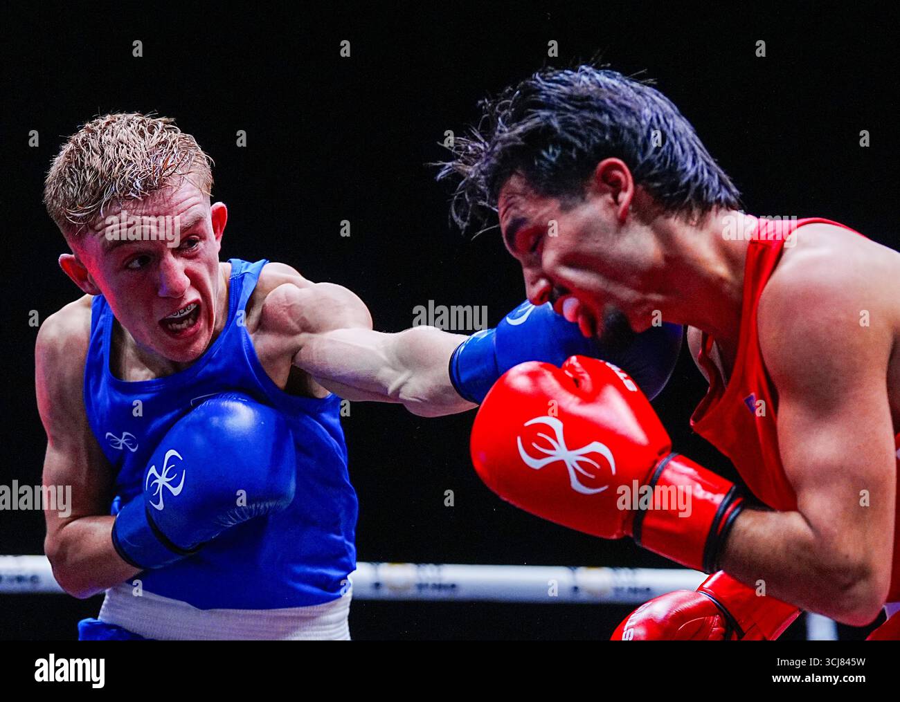 England's Reece Readshaw (BLUE) and Italy's Salvatore Attrattivo (RED ...