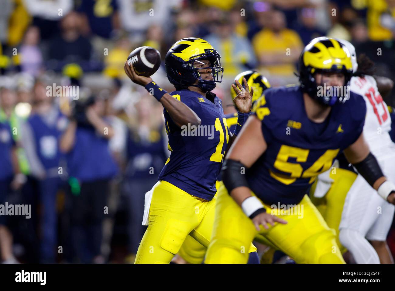 Michigan quarterback Bryce Underwood passes during an NCAA football ...