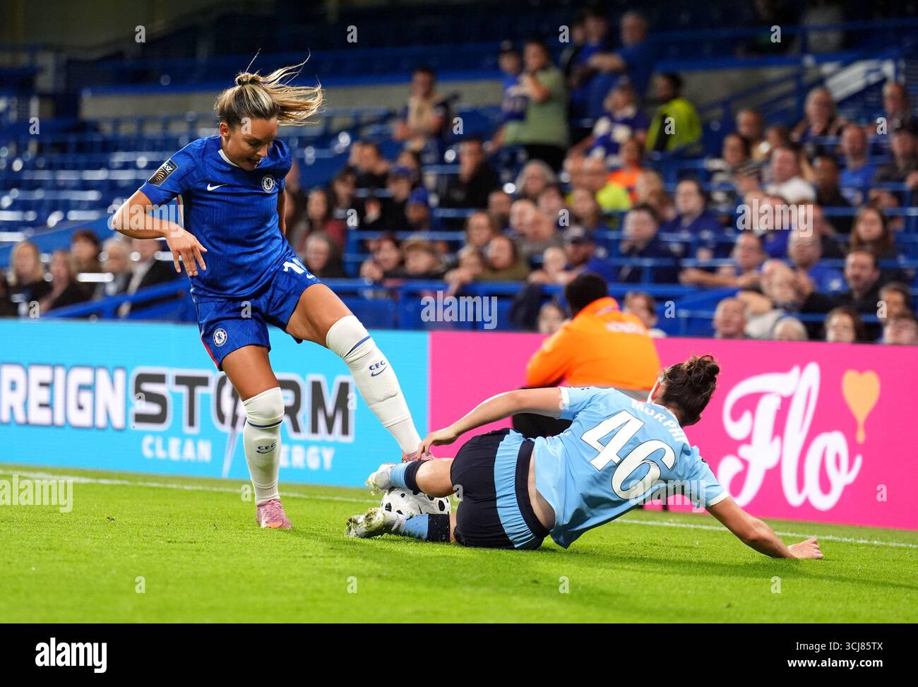 Manchester City's Lily Murphy (right) challenges Chelsea's Johanna ...