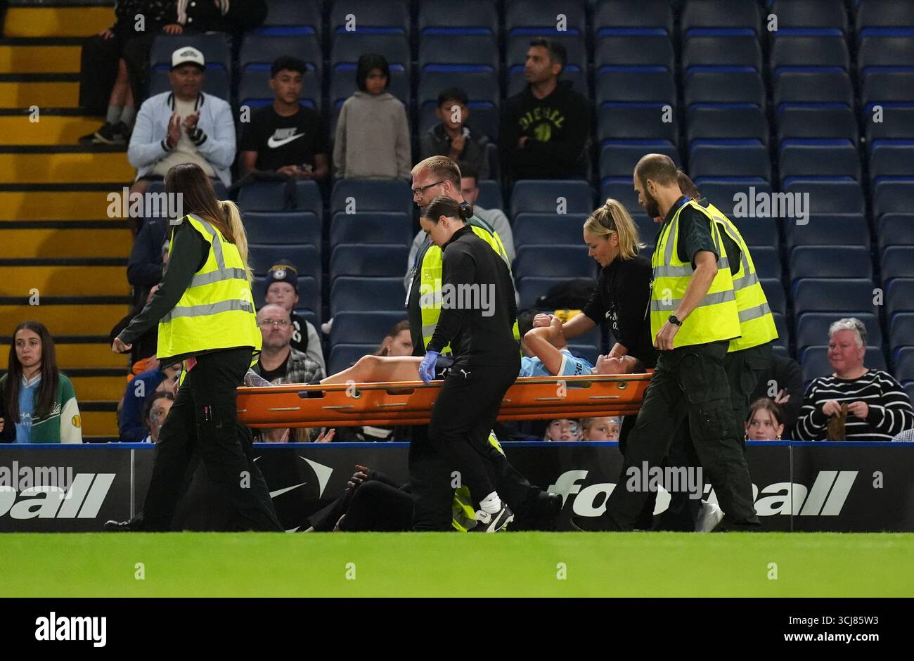 Manchester City's Lily Murphy is taken off on a stretcher after a ...
