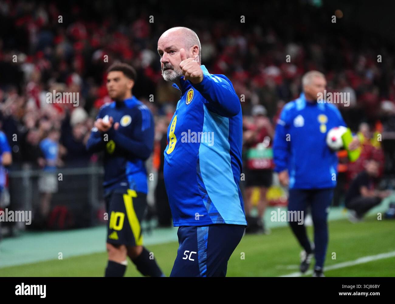 Scotland manager Steve Clarke salutes the fans following the World Cup ...