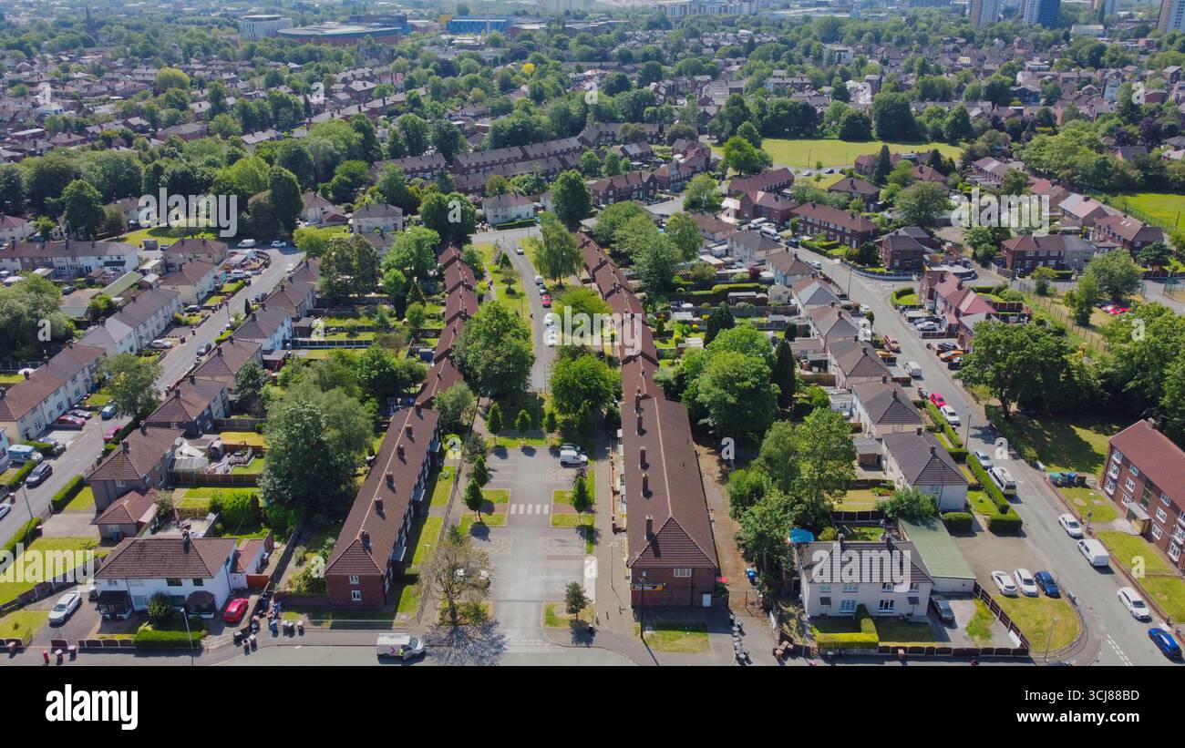 Aerial view of a suburban neighborhood with green spaces and ...