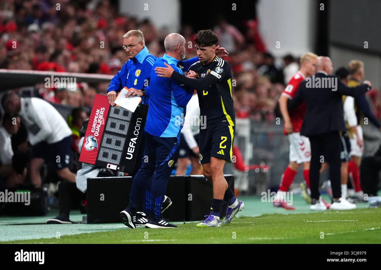 Scotland manager Steve Clarke greets Aaron Hickey during the World Cup ...