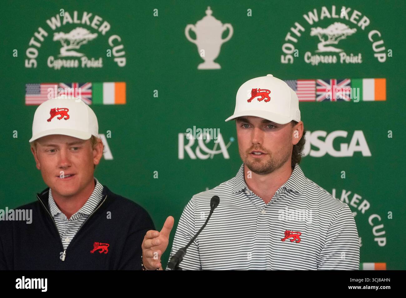 The Great Britain and Ireland team's Cameron Adam, right, speaks with ...