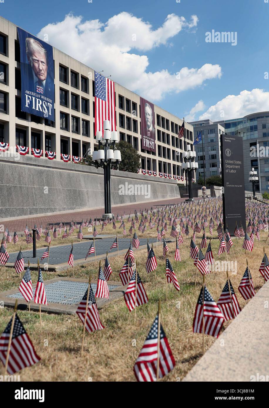 A large photograph of U.S. President Donald Trump in Washington, DC ...