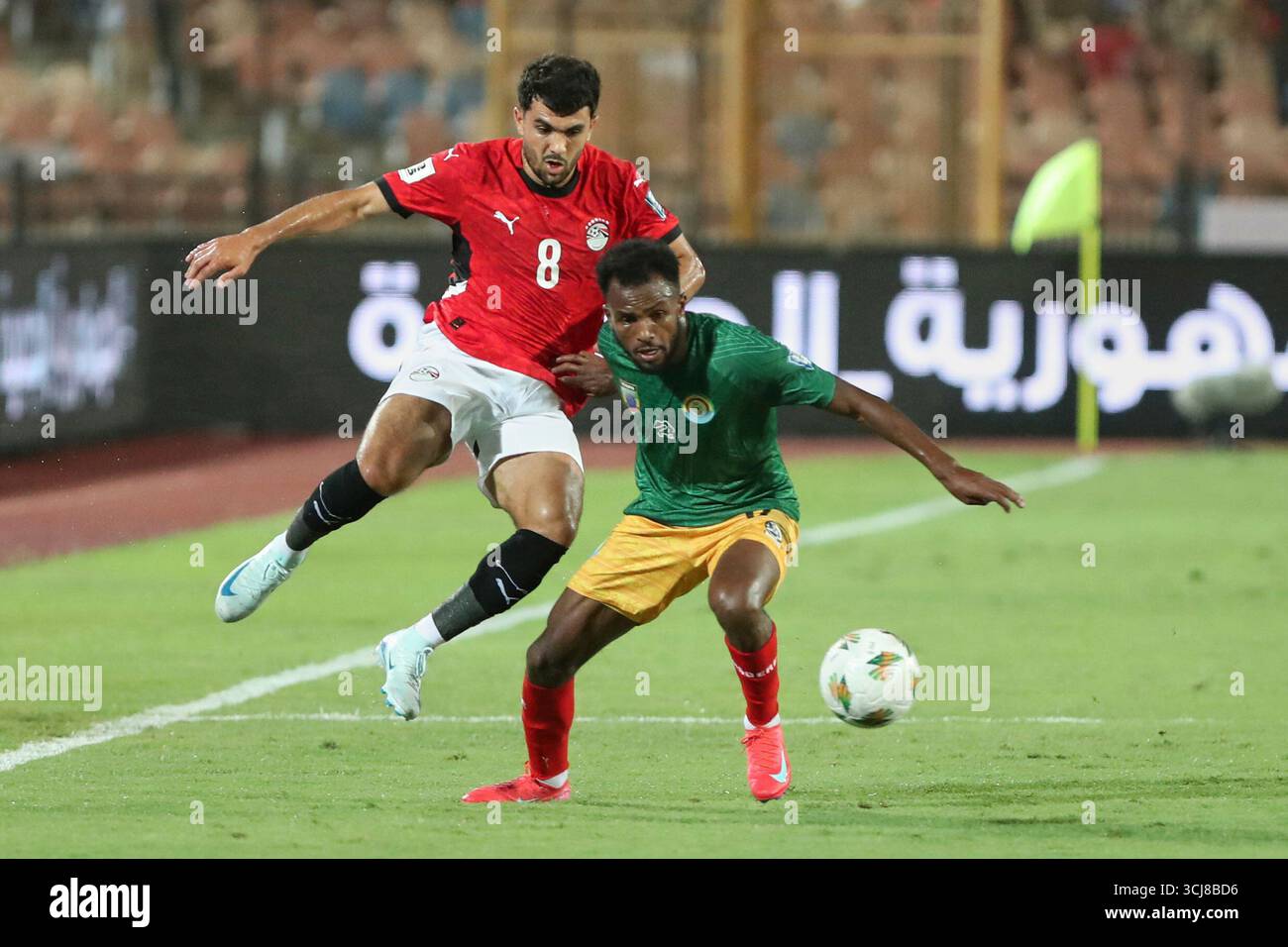 Egypt's Hamdy Fathy, left, is challenged by Ethiopia's Ahmed Reshid ...