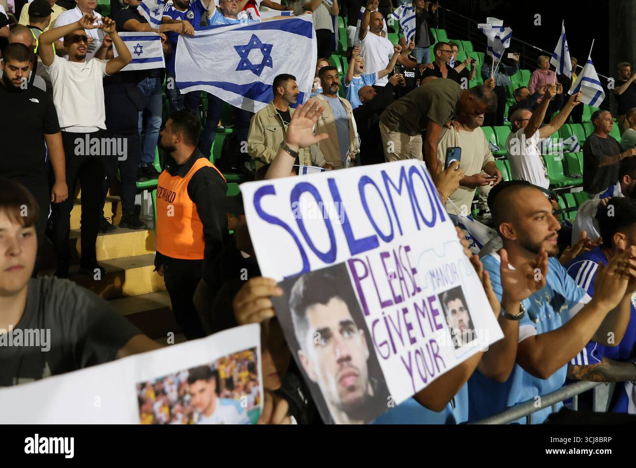 Israel's fans cheer during a group 1, World Cup qualifier soccer match ...