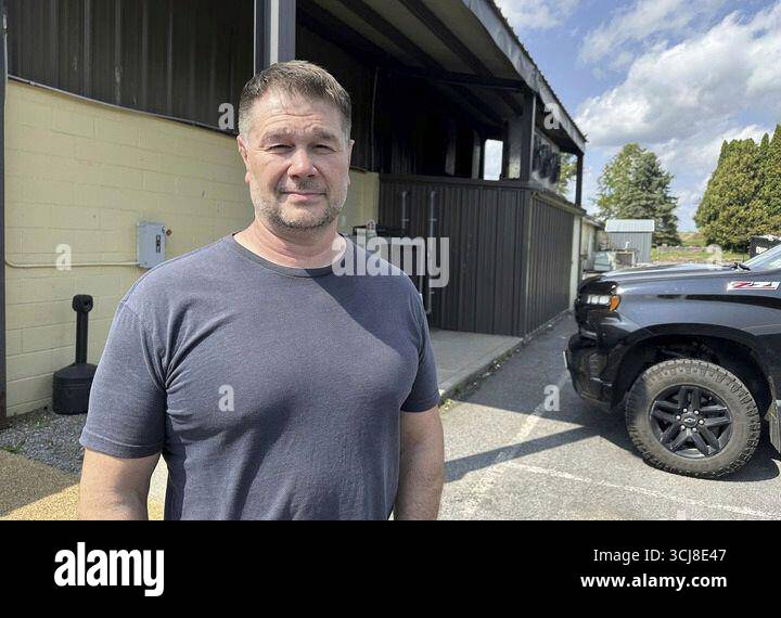 Lenny Schmidt stands outside his food manufacturing facility that was ...