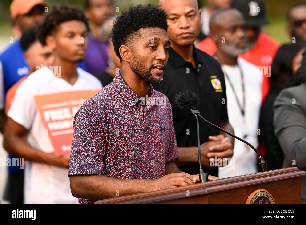 Baltimore mayor Brandon Scott, left, speaks next to Maryland Gov. Wes ...
