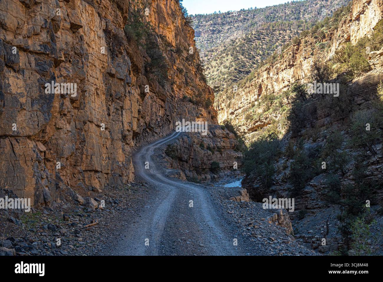 Narrow rocky path through canyon cliffs in Morocco Atlas Mountains with ...