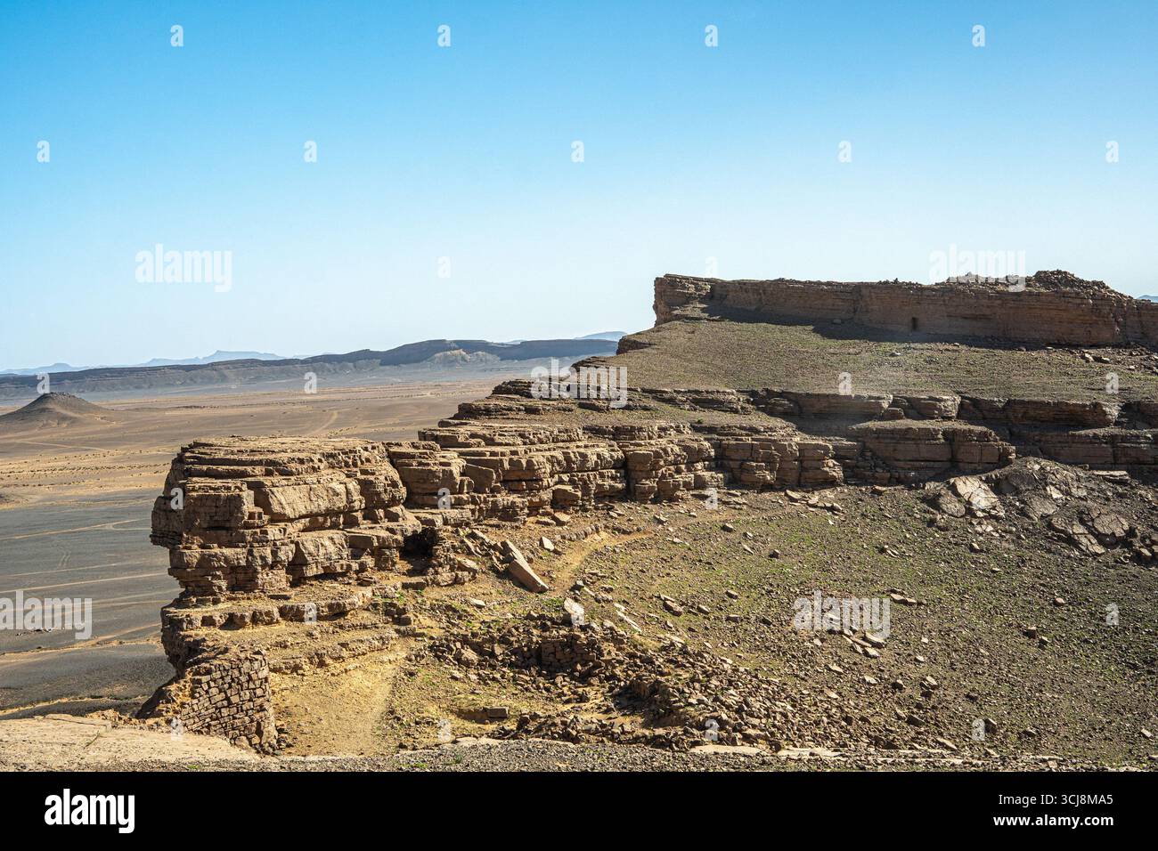 Rocky desert plateau in Morocco Sahara with layered stone cliffs ...