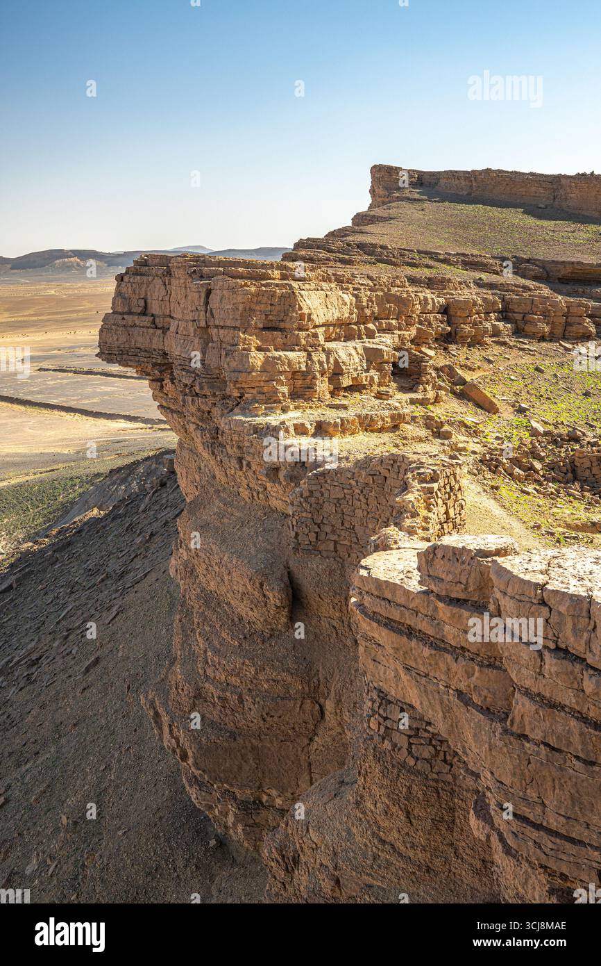 Moroccan Sahara desert escarpment with rugged rocky edges flat plateau ...