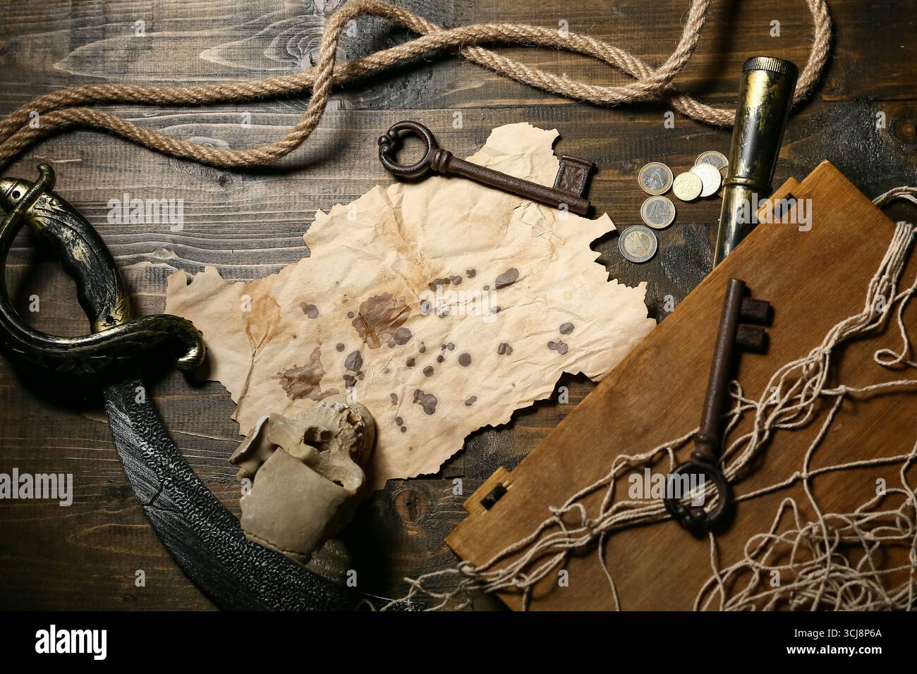 Old skull coins on sea hi-res stock photography and images - Alamy