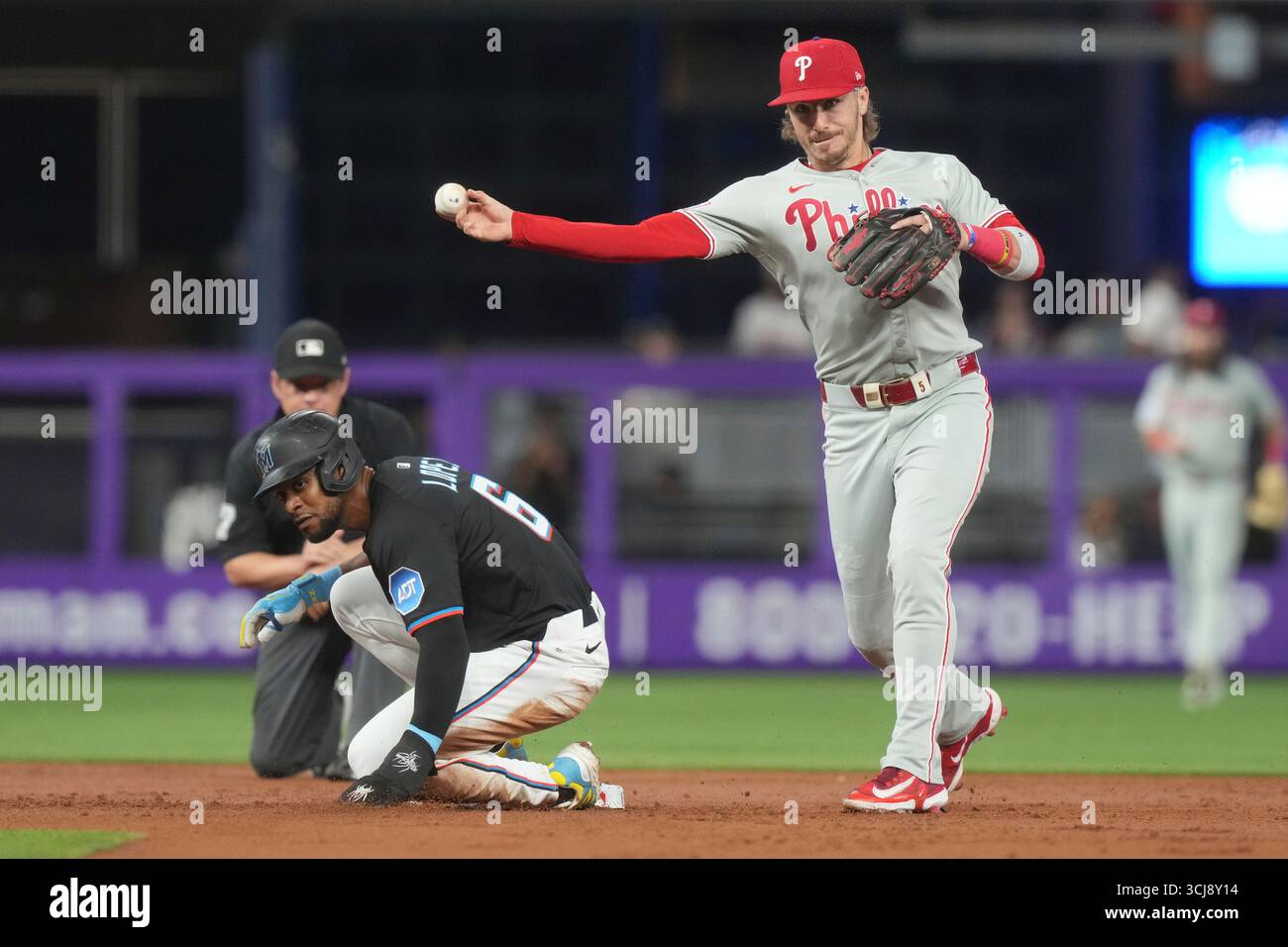 Philadelphia Phillies second baseman Bryson Stott throws to first base ...