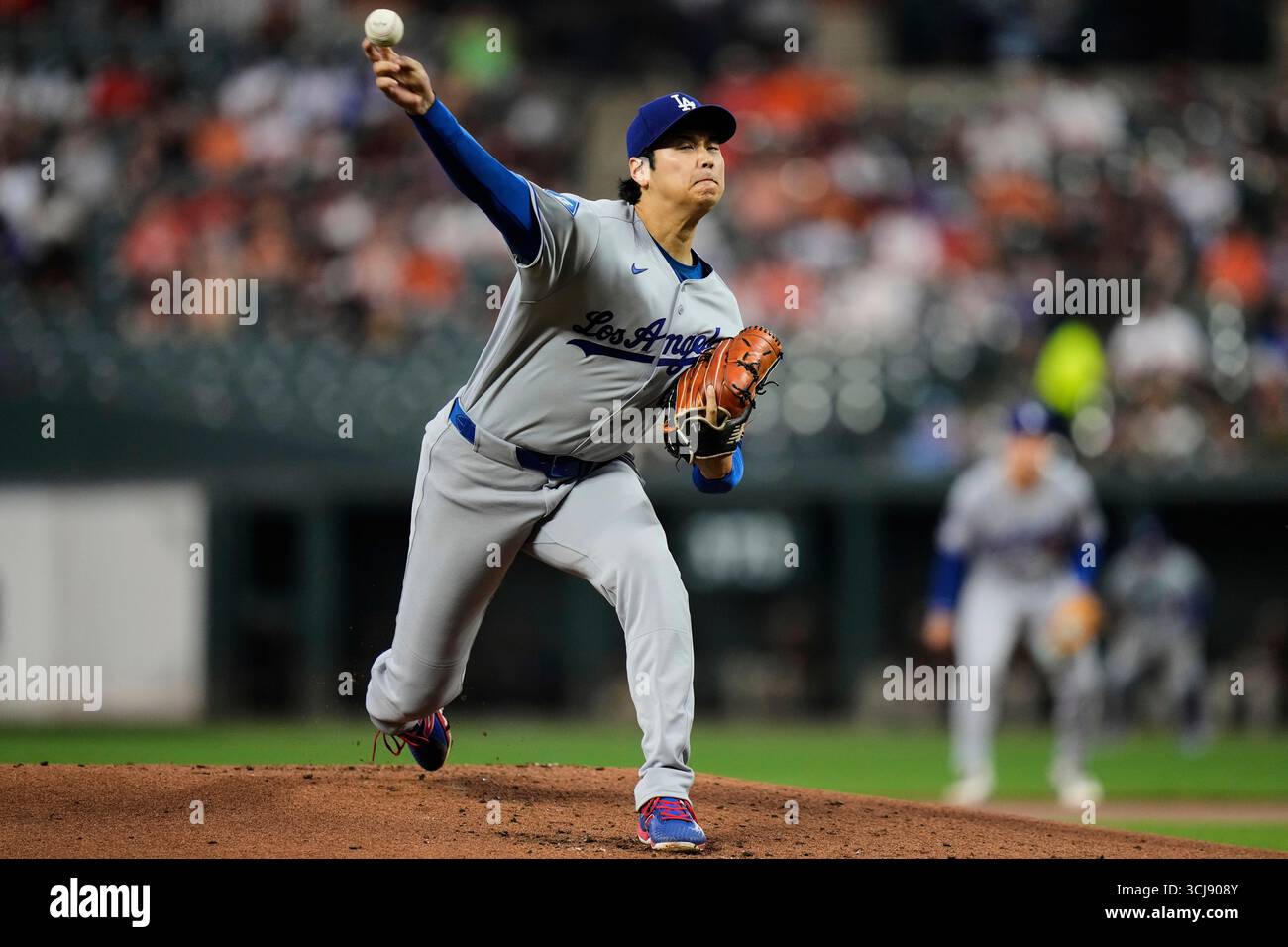 Los Angeles Dodgers starting pitcher Shohei Ohtani delivers during the ...