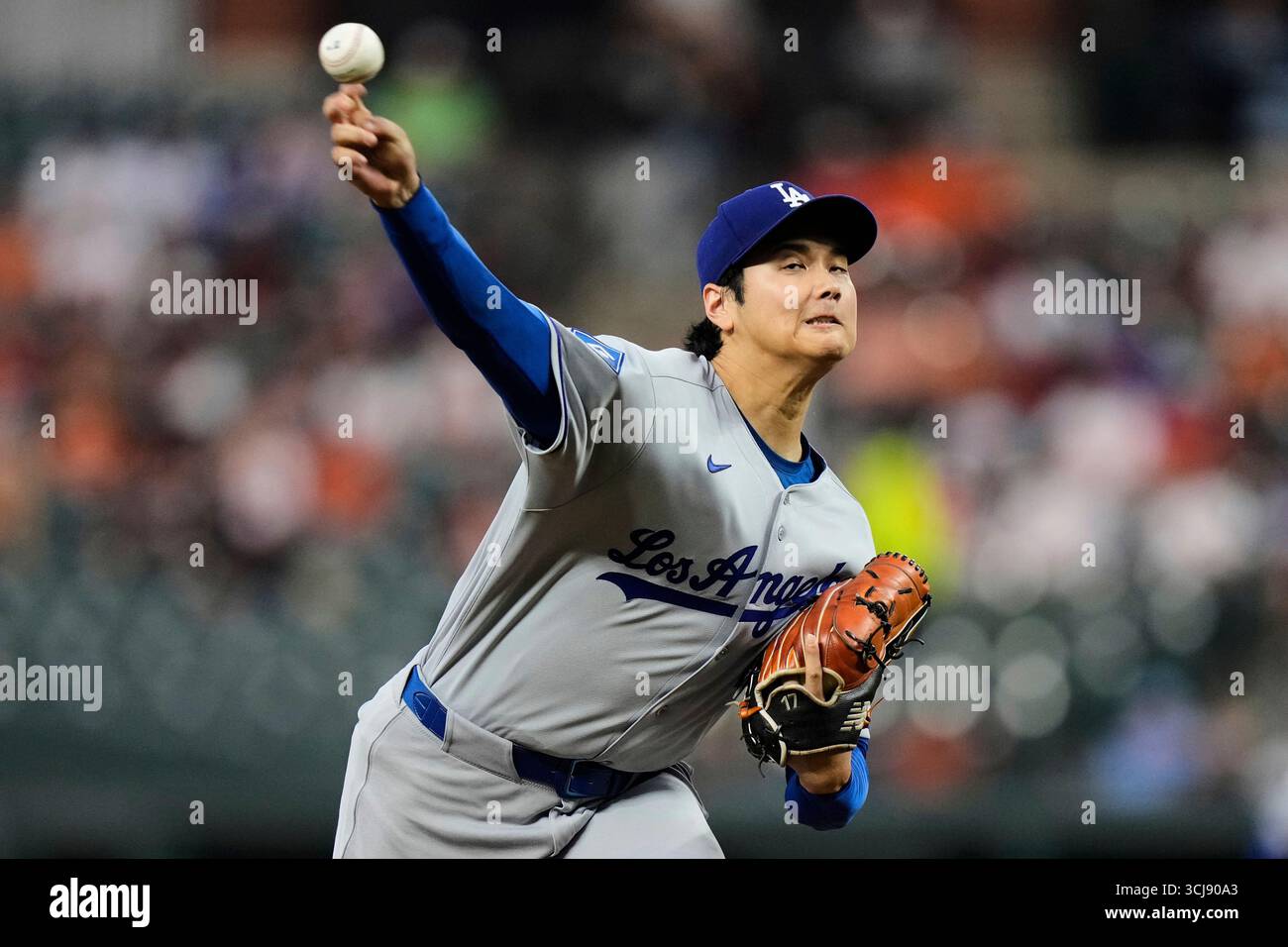 Los Angeles Dodgers starting pitcher Shohei Ohtani delivers during the ...