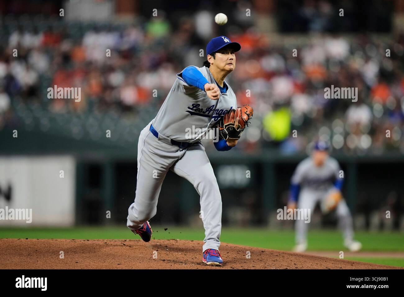 Los Angeles Dodgers starting pitcher Shohei Ohtani delivers during the ...