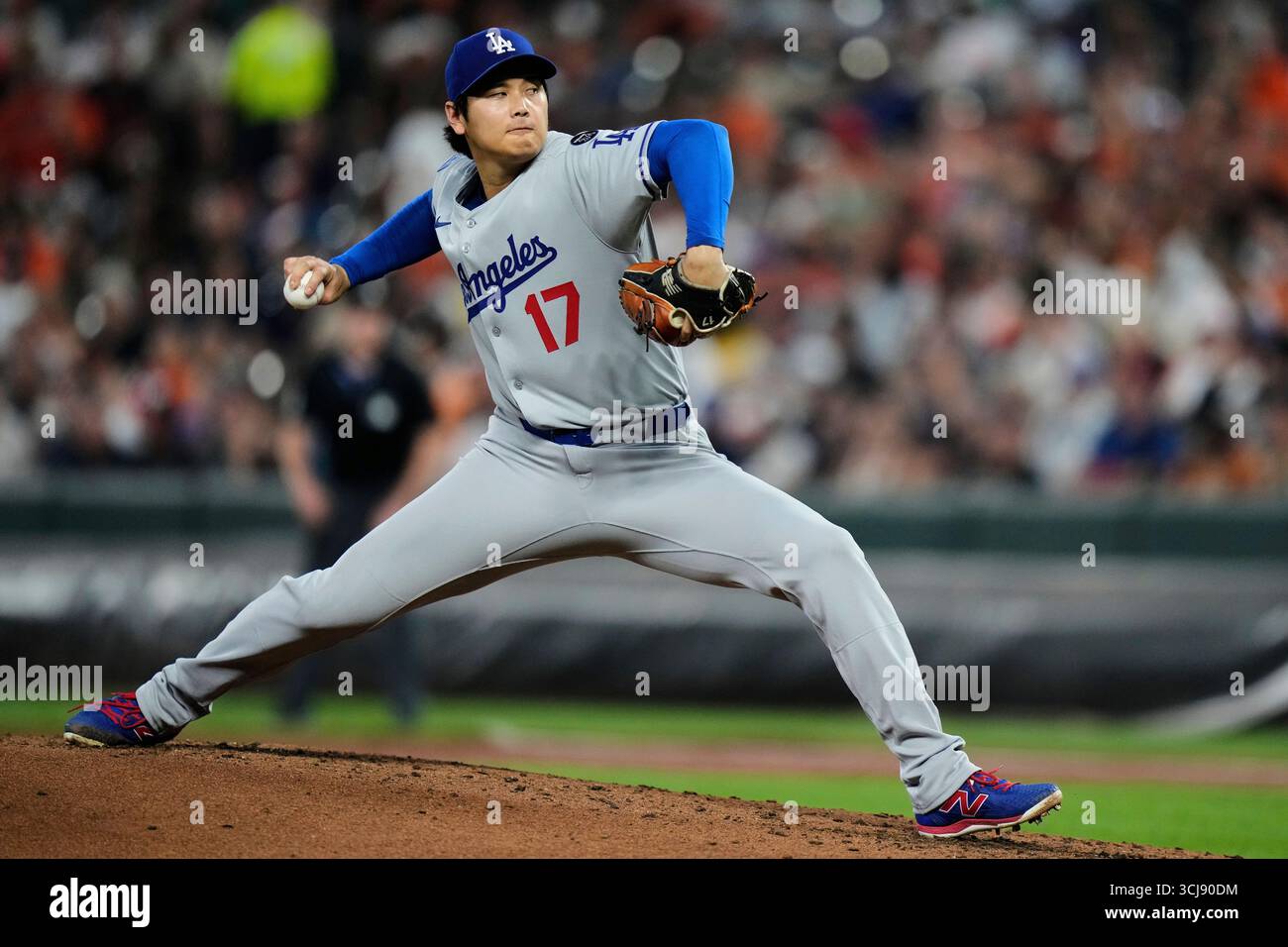 Los Angeles Dodgers starting pitcher Shohei Ohtani delivers during the ...