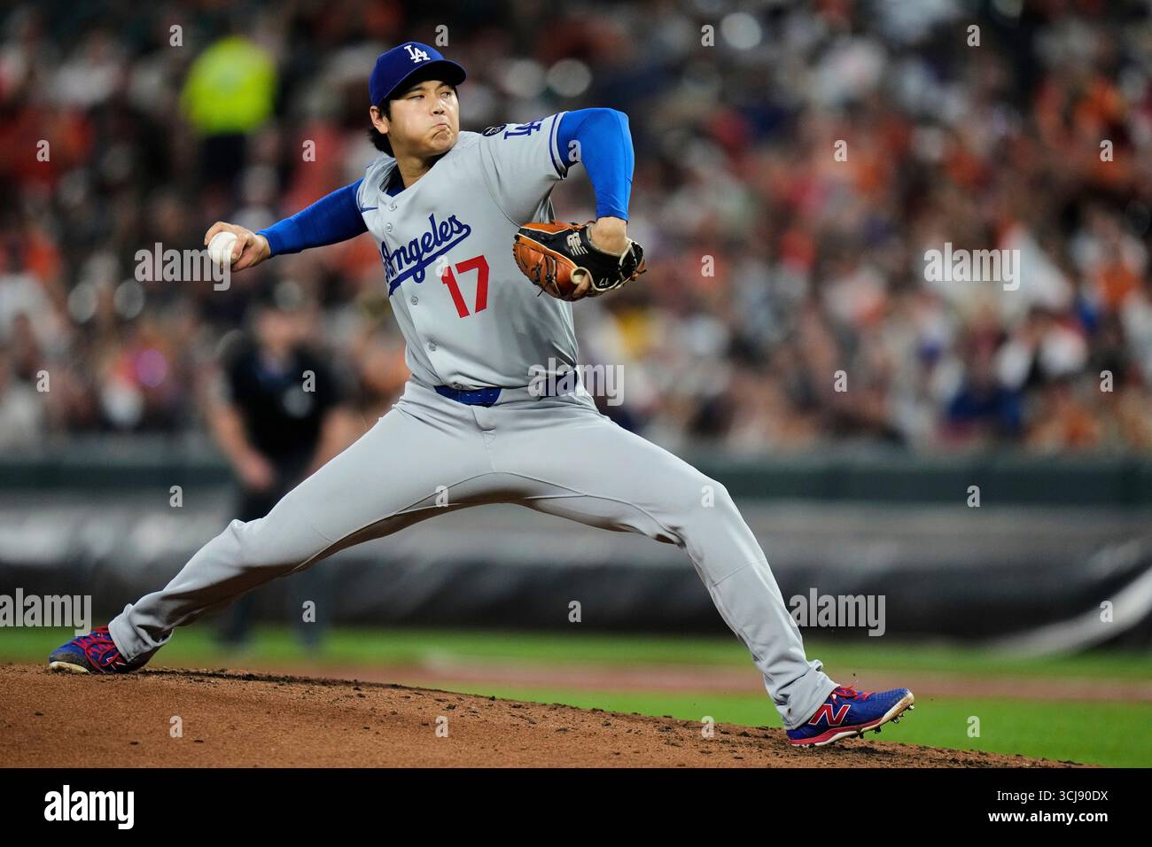Los Angeles Dodgers starting pitcher Shohei Ohtani delivers during the ...