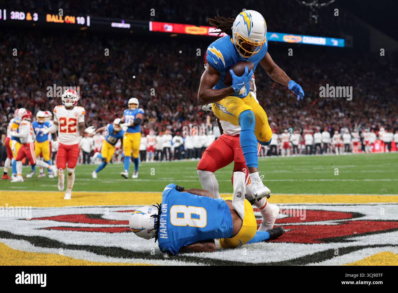 Los Angeles Chargers wide receiver Quentin Johnston scores against the ...