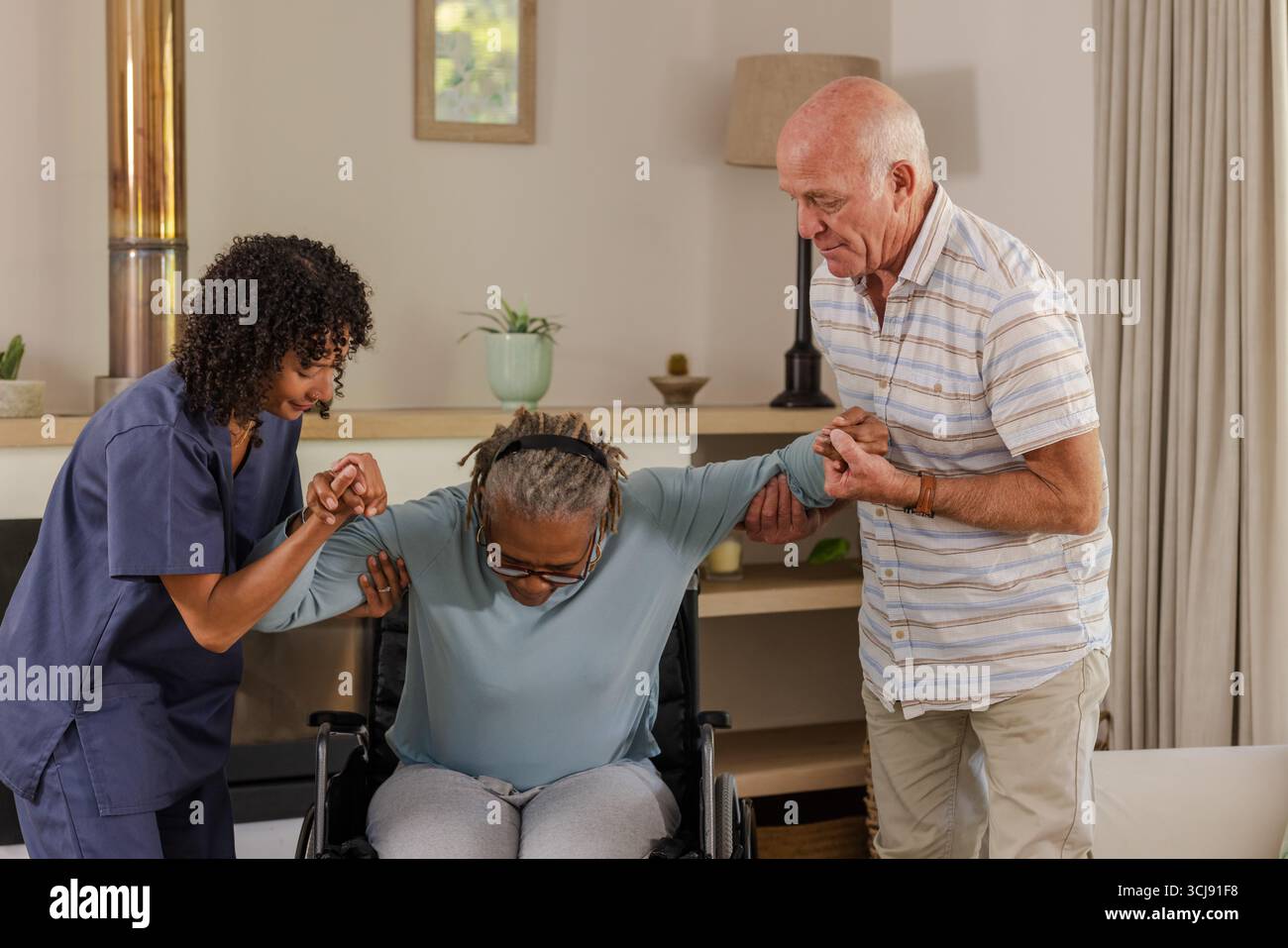 Diverse caregiver senior patient hi-res stock photography and images ...