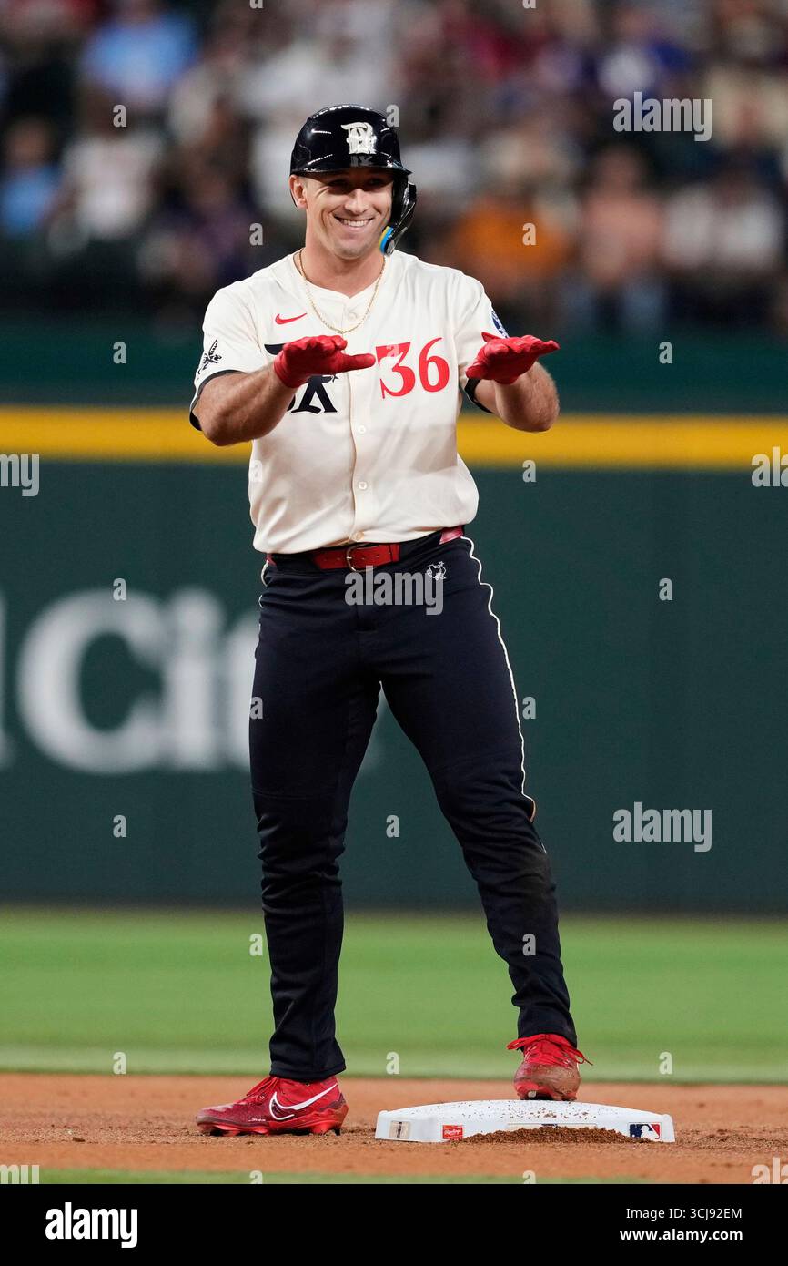 Texas Rangers' Wyatt Langford celebrates his double in the first inning ...