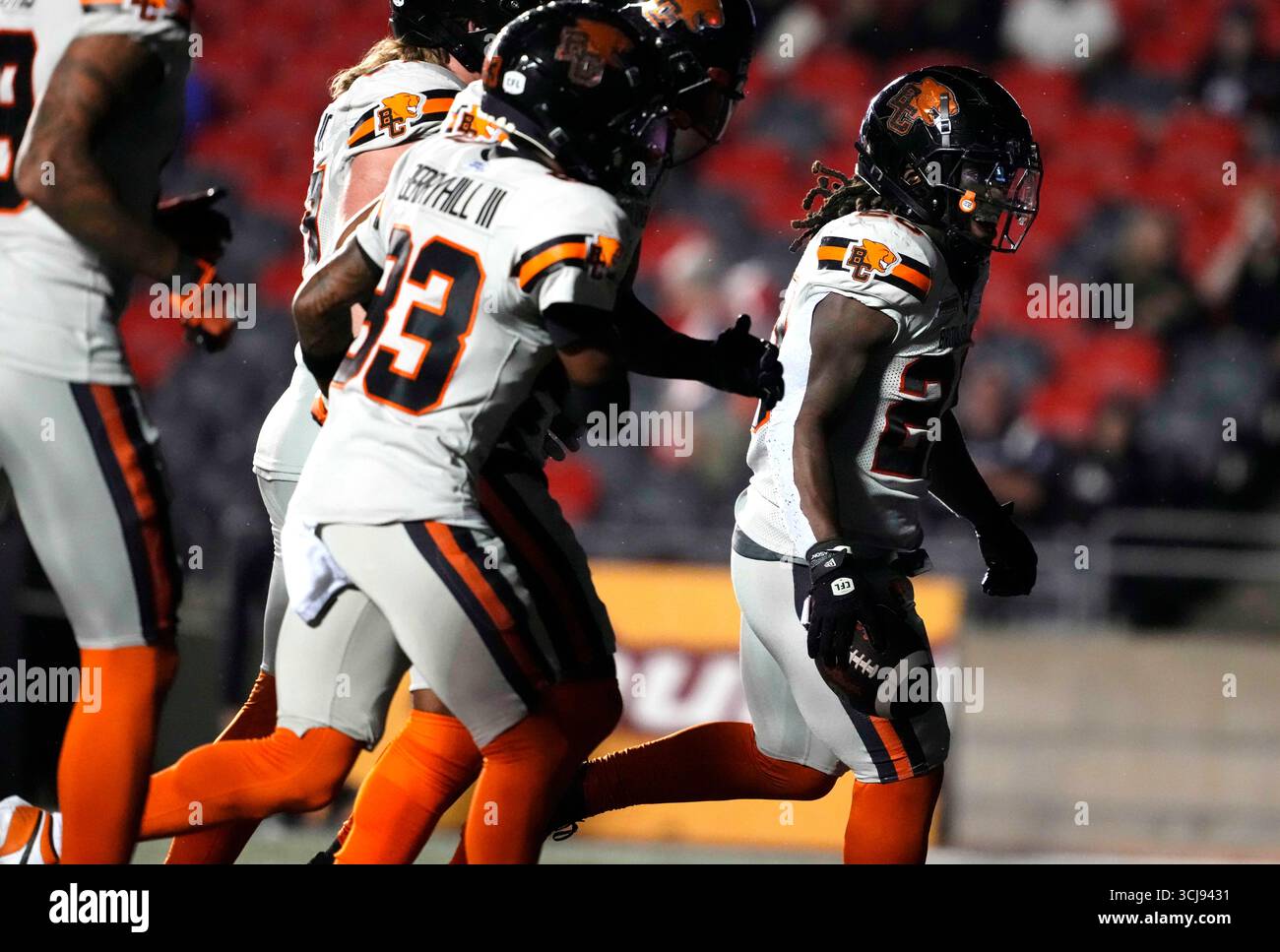 B.C. Lions running back James Butler (20) reacts after scoring a ...