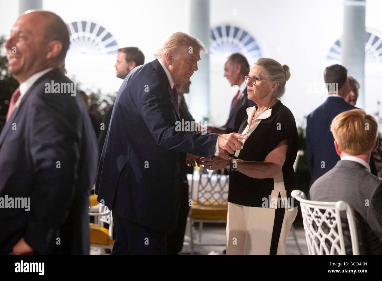 President Donald Trump hosts a dinner with members of his ...