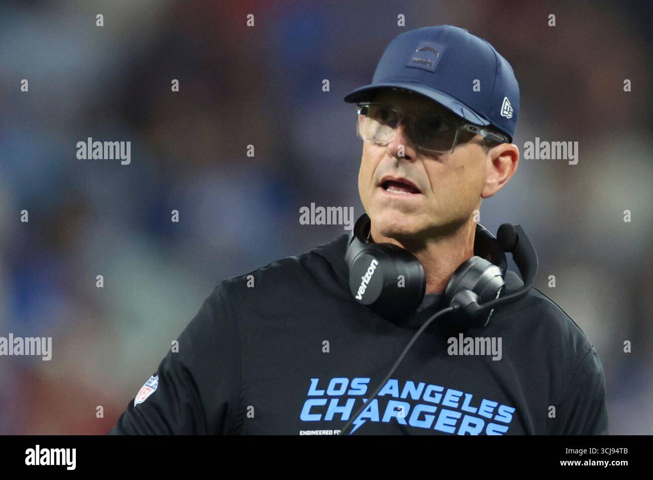 Los Angeles Chargers head coach Jim Harbaugh watches during the first ...