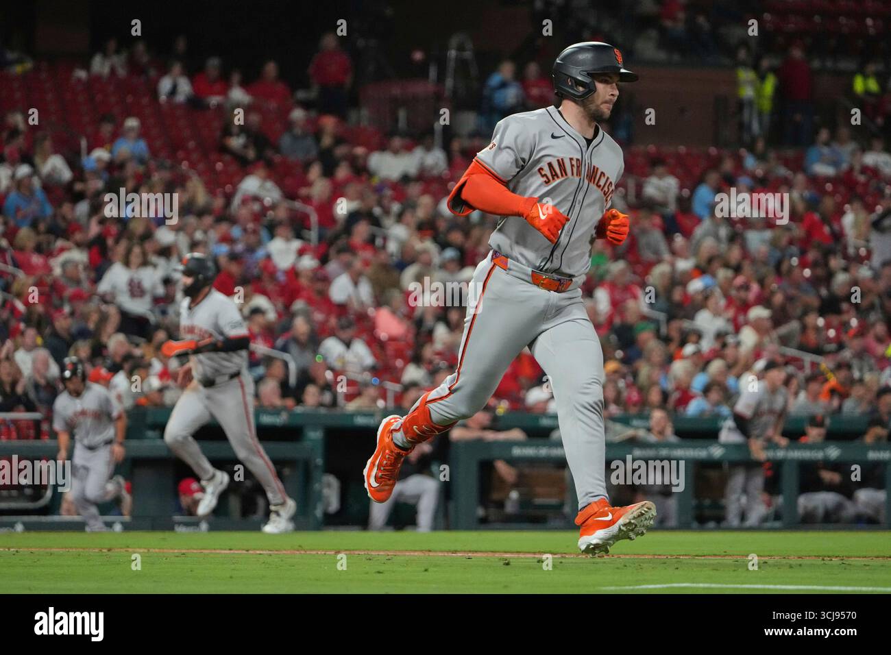 San Francisco Giants' Drew Gilbert, right, singles as teammate Casey ...