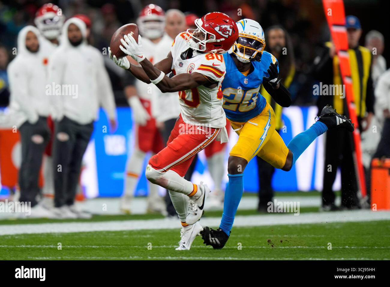 Kansas City Chiefs wide receiver Tyquan Thornton catches a pass ahead of Los Angeles Chargers ...