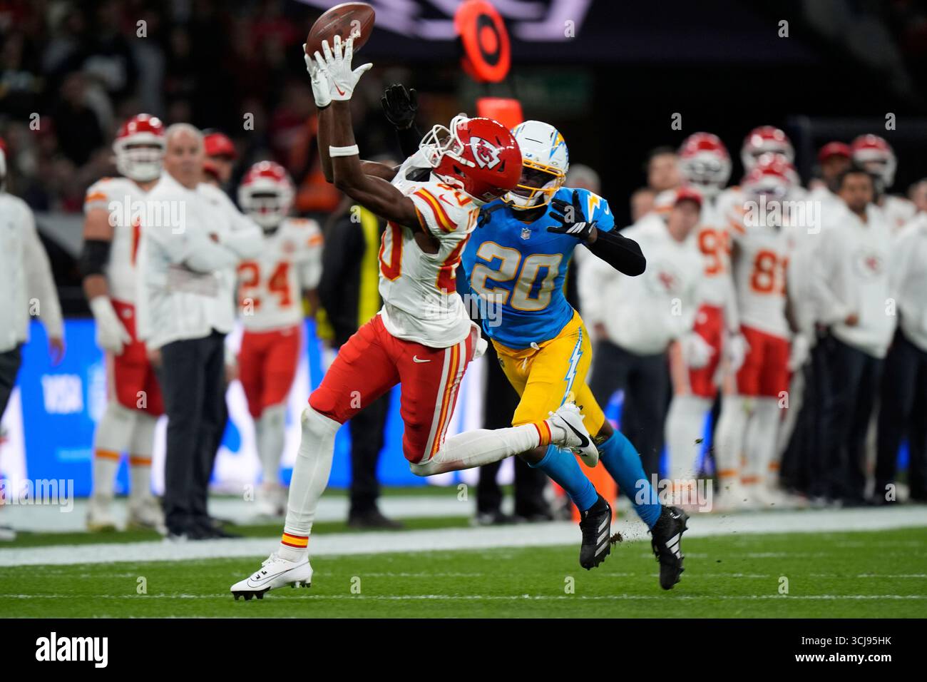 Kansas City Chiefs wide receiver Tyquan Thornton catches a pass ahead of Los Angeles Chargers ...