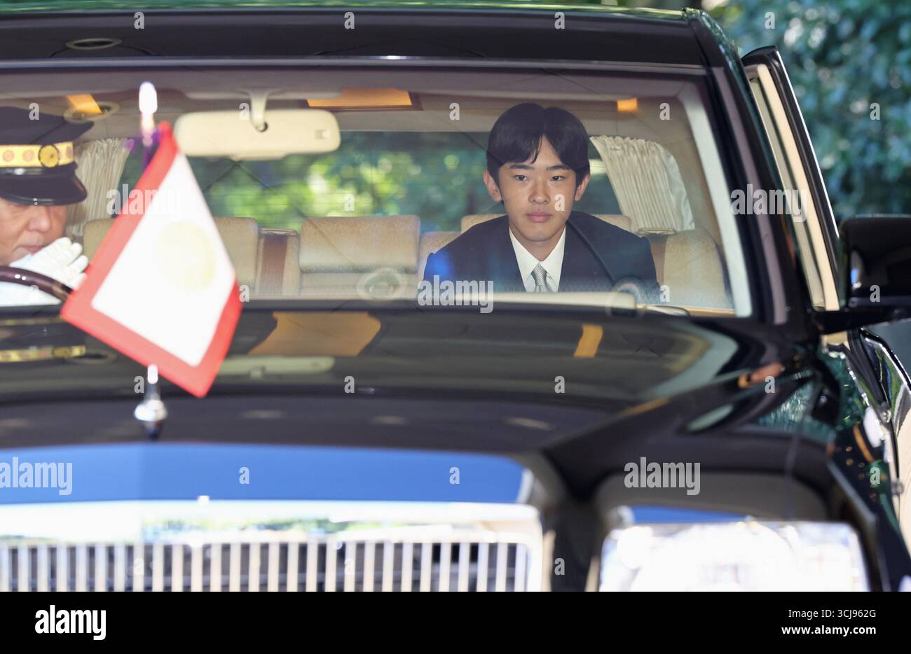 A vehicle carrying Japanese Prince Hisahito departs his Akasaka Estate ...